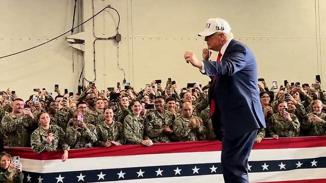Trump busts out his signature dance moves aboard aircraft carrier in Japan