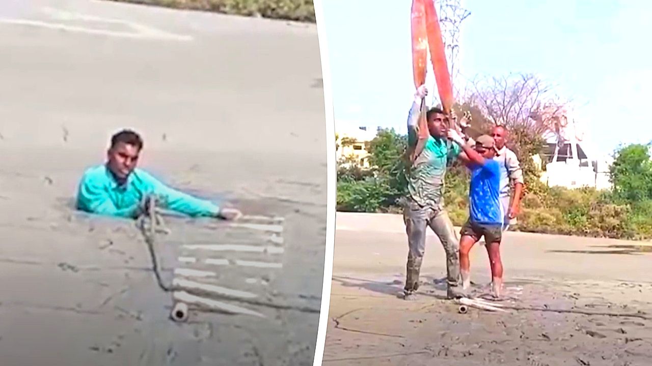 Man trapped up to neck in quicksand rescued in tense crane operation