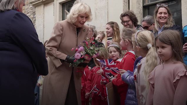 Queen pins final poppy on huge war memorial display