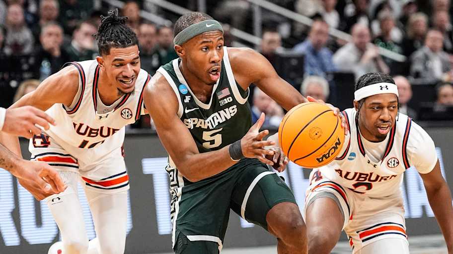 Former Spartan Tre Holloman goes off in first exhibition game with NC State