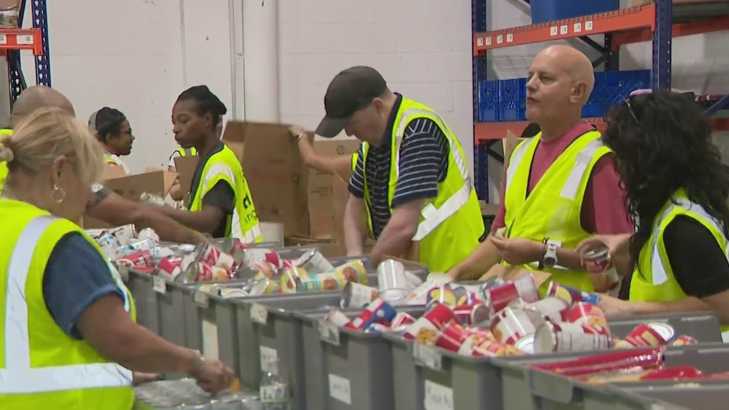 Cargo planes preparing as volunteers pack essential goods to send to ...