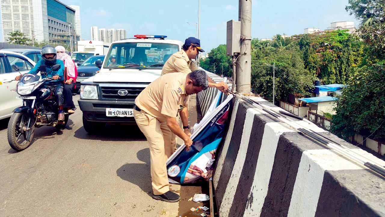 Vanrai police prioritize road safety, remove illegal banners on Mumbai’s WEH