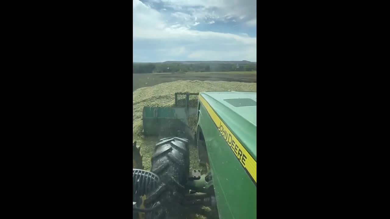 Fascinating forage harvester during corn harvest in Joliet, USA