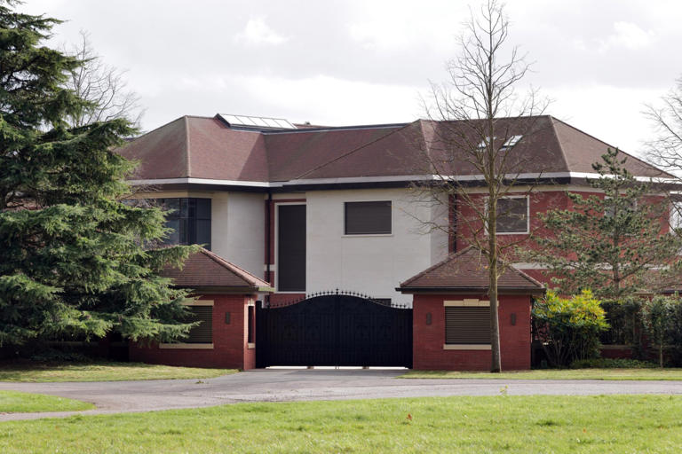Shuttered and empty: Prince Andrew's marital home