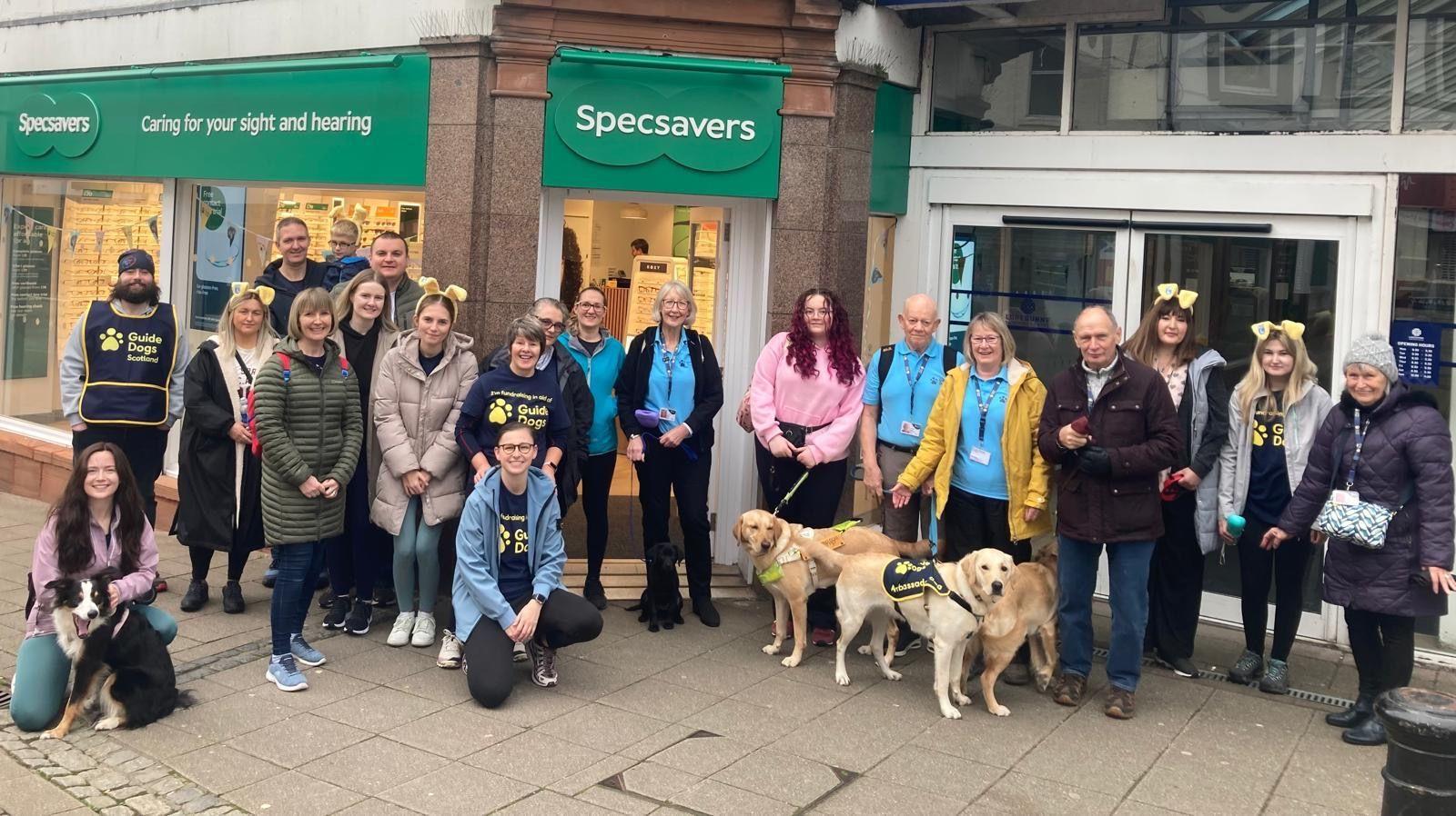 Specsavers Dumfries staff complete charity walk for Guide Dogs