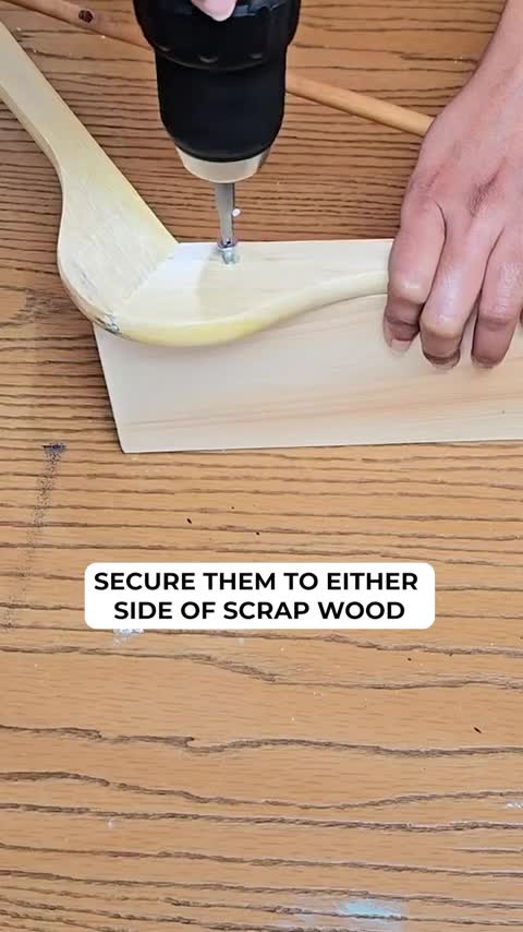 Grab a pack of Home Depot hangers for this brilliant living room hack!