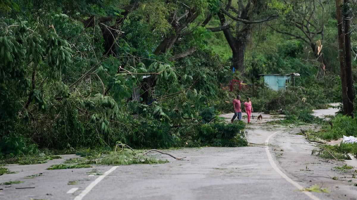 Melissa weakens as it churns across Cuba as a Category 2 storm