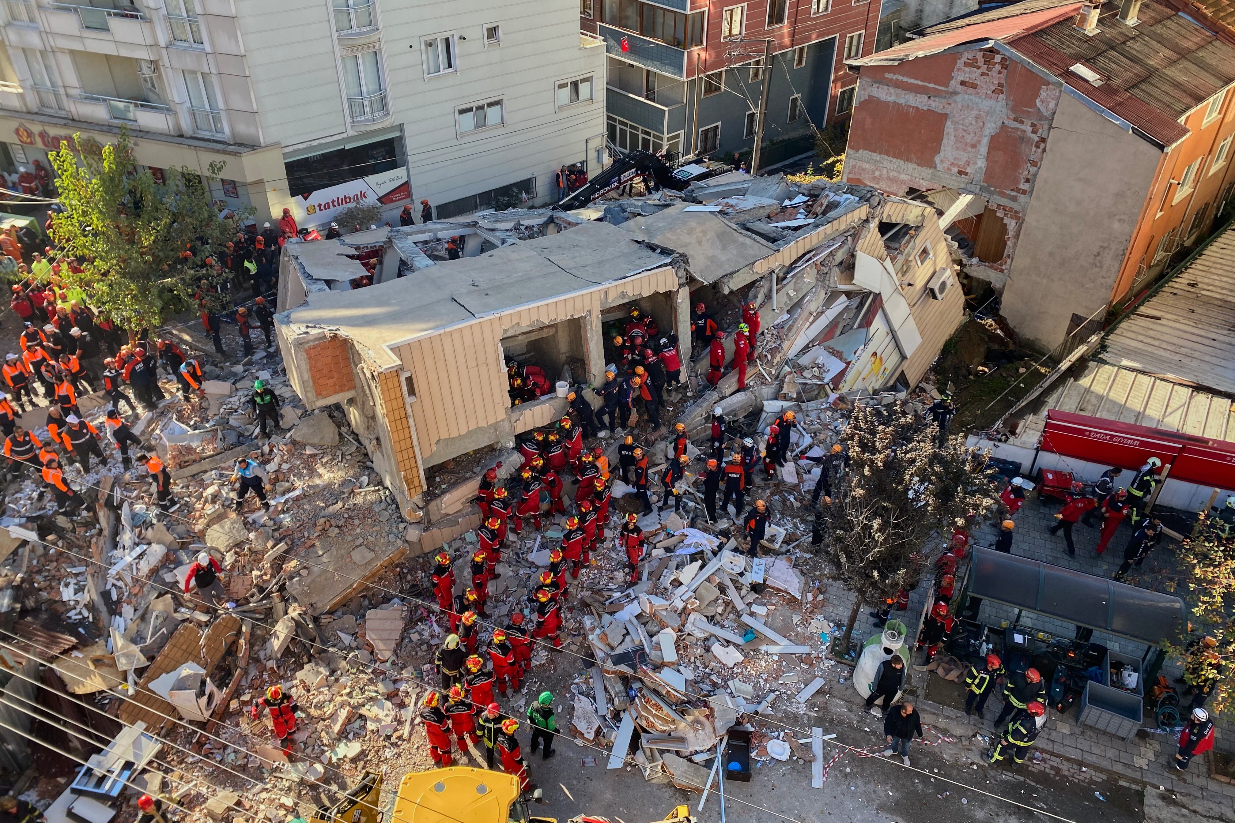 Rescuers recover bodies of two children after building collapse in Turkey