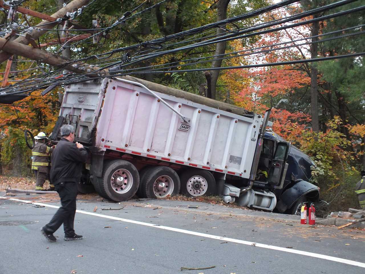 Dump Truck Crashes Into Utility Pole In Hawthorne