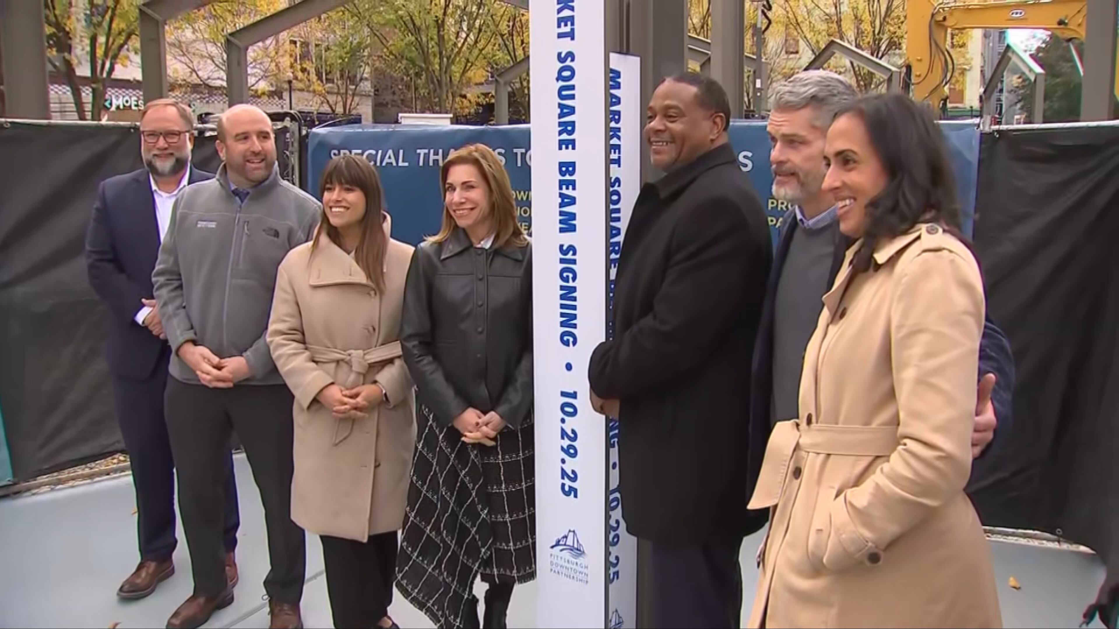 Leaders sign beam to celebrate Market Square modernization halfway point