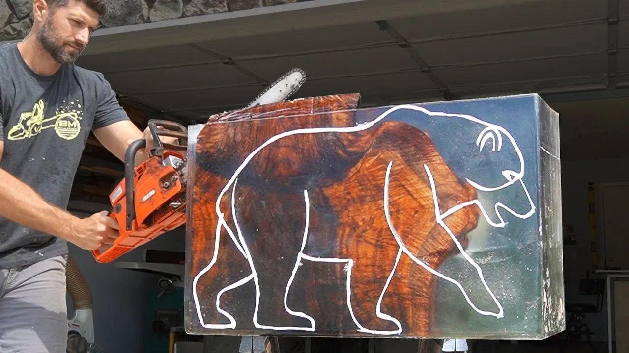Chainsaw carving a grizzly bear from epoxy & wood