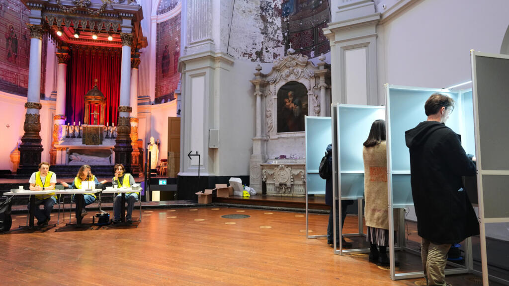 Dutch exit polls put centrist party narrowly ahead of far right