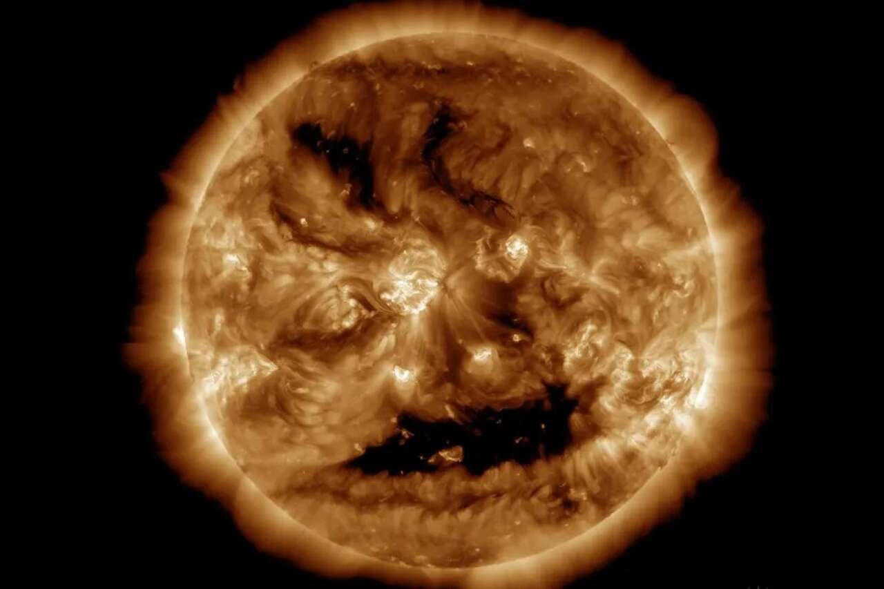 The Sun just photobombed Halloween with a creepy cosmic grin