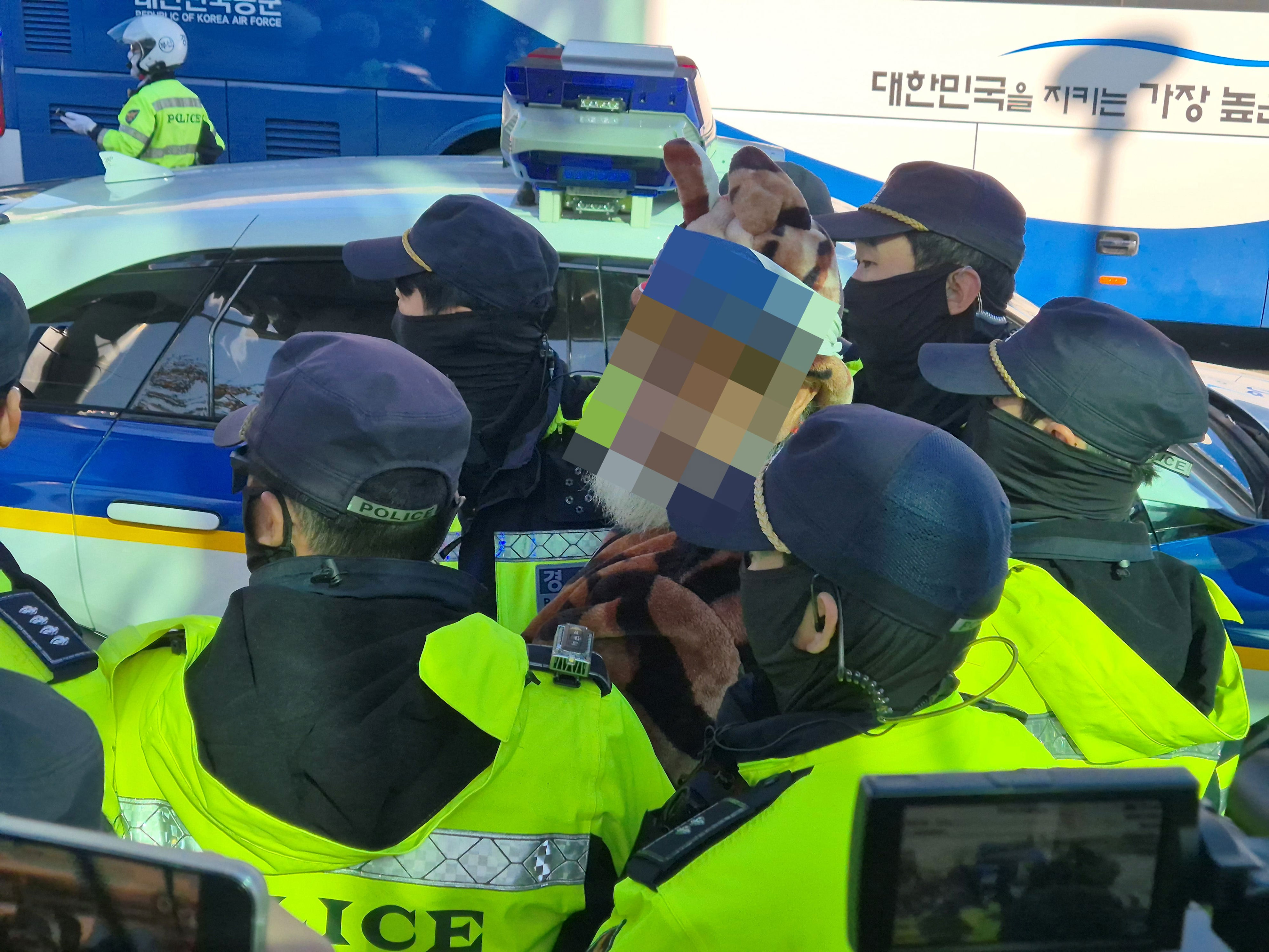 YouTuber and Others Arrested for Obstructing Police at Xi Rally
