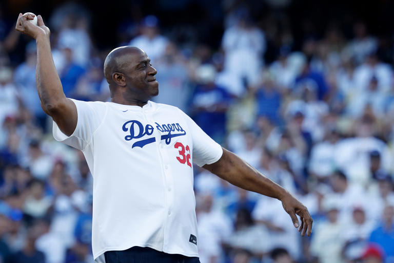 NBA legend Magic Johnson throws out first pitch at World Series Game 5
