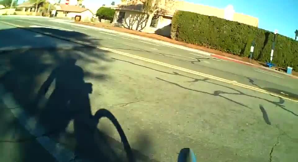 Cyclist Wipes Out in Street
