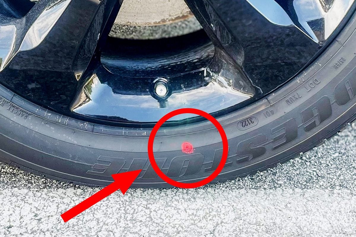 If you see red or yellow dots on your tires, here’s what it means
