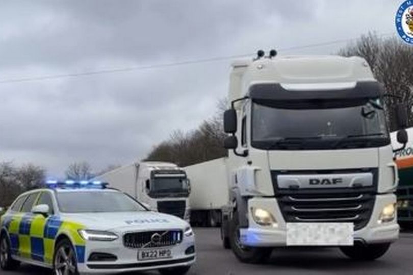 Trucker transporting flammable liquids caught eating on motorway while ...