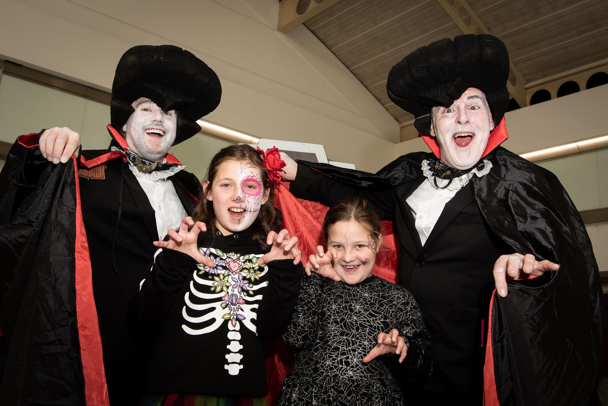 Families enjoy a Dracula Spectacular at Friars Square