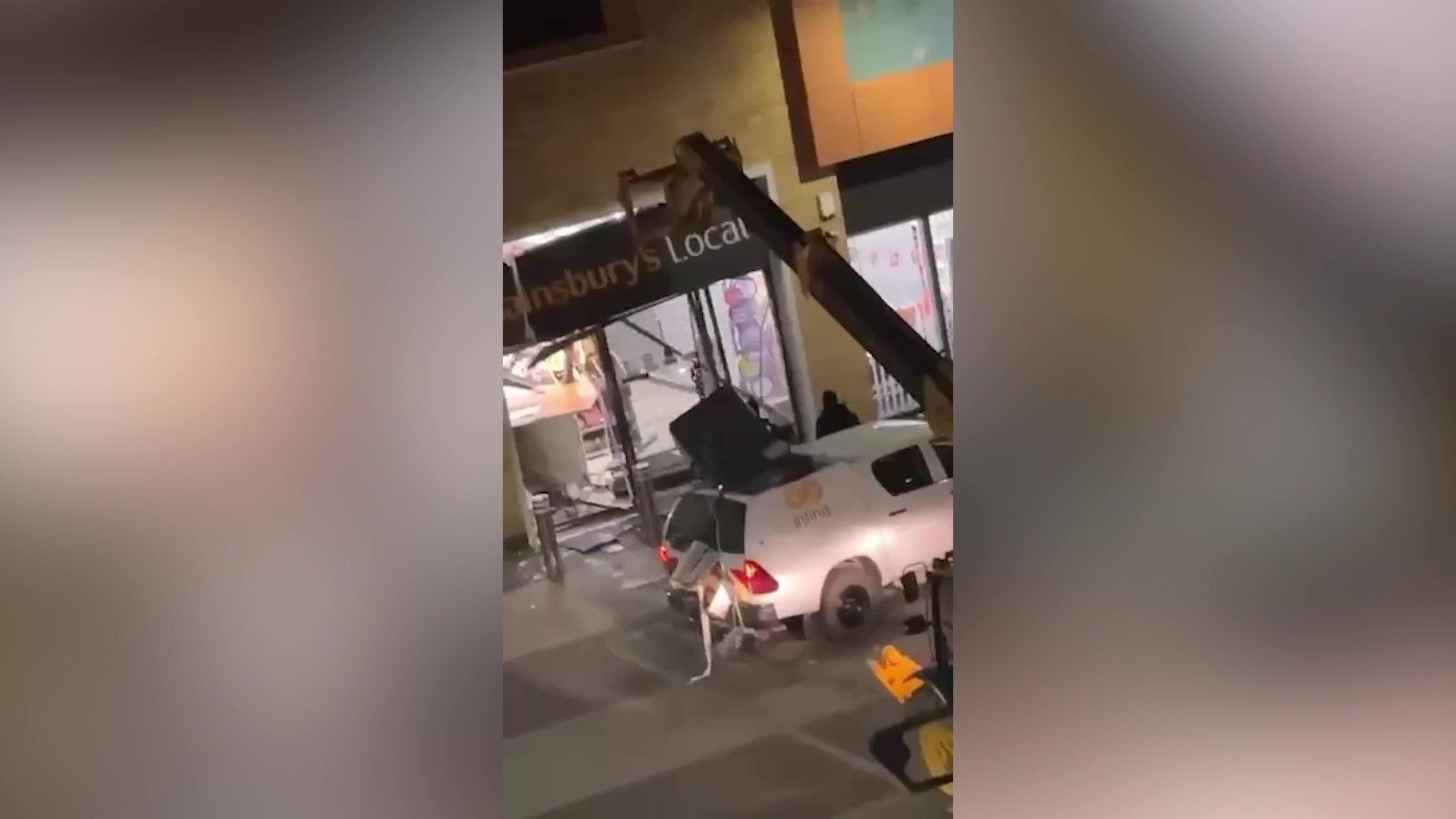 Watch: Masked men use telehandler to rip ATM from Milton Keynes store