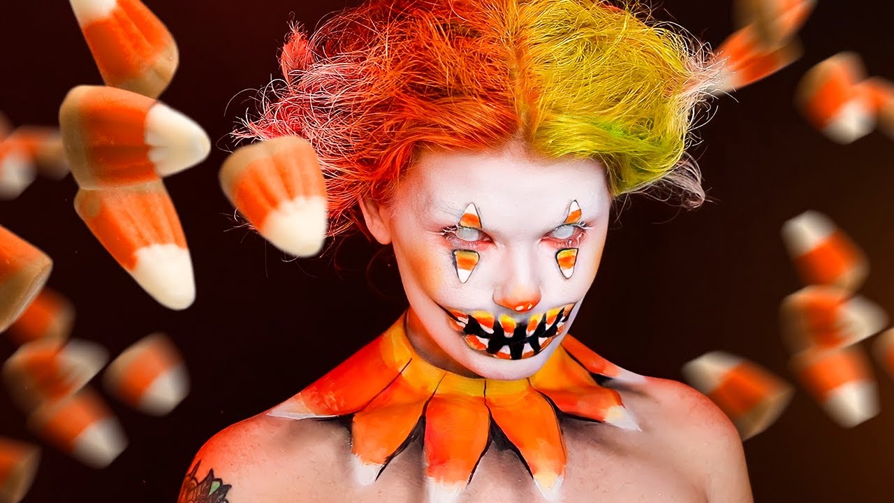 Candy corn clown costume with detailed Halloween makeup