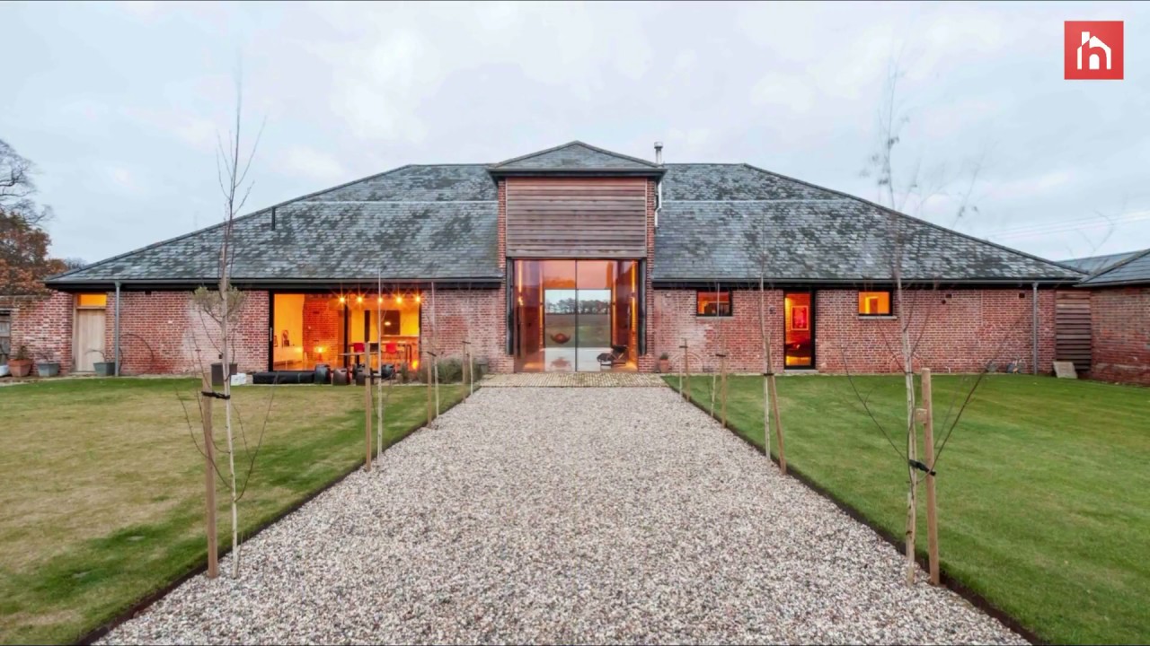 Huge barn transformed into a modern home with an open floor plan