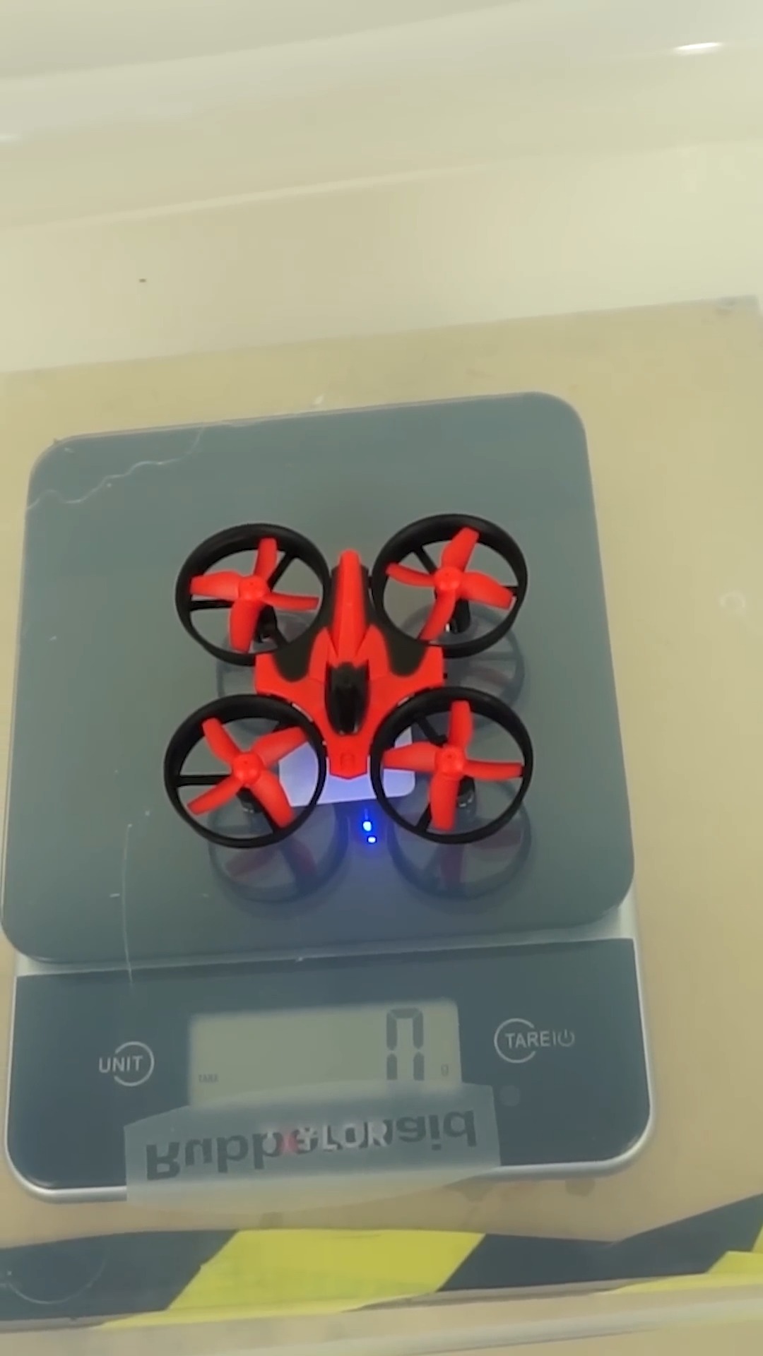 The physics of a drone flying in a closed container