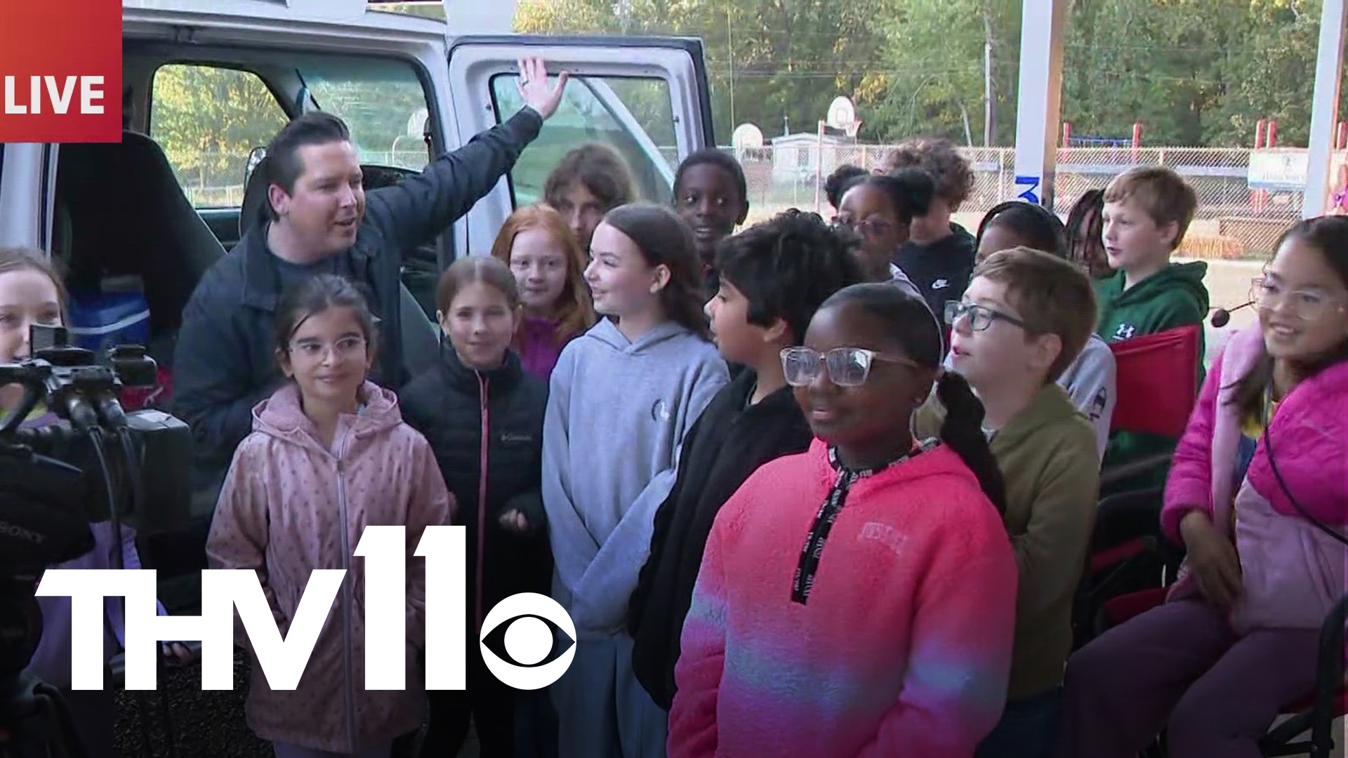 Students take part in Touch-a-Truck Day at Baker Elementary in Little Rock