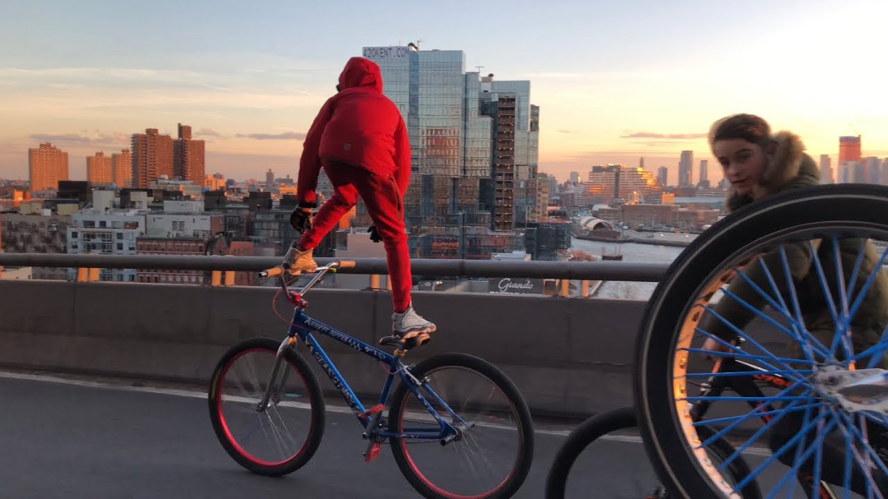 Surfing over NYC bridge on a custom dirtbike