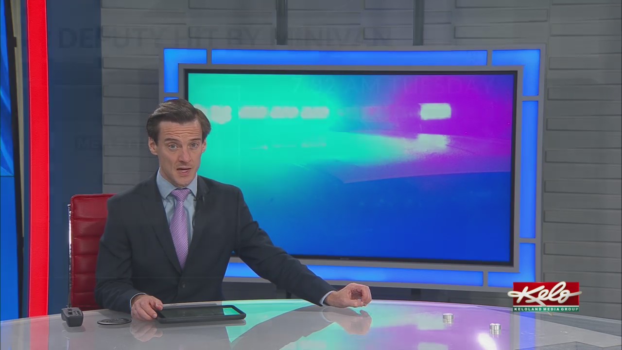 Spink Co. Deputy hit by car while helping pedestrian