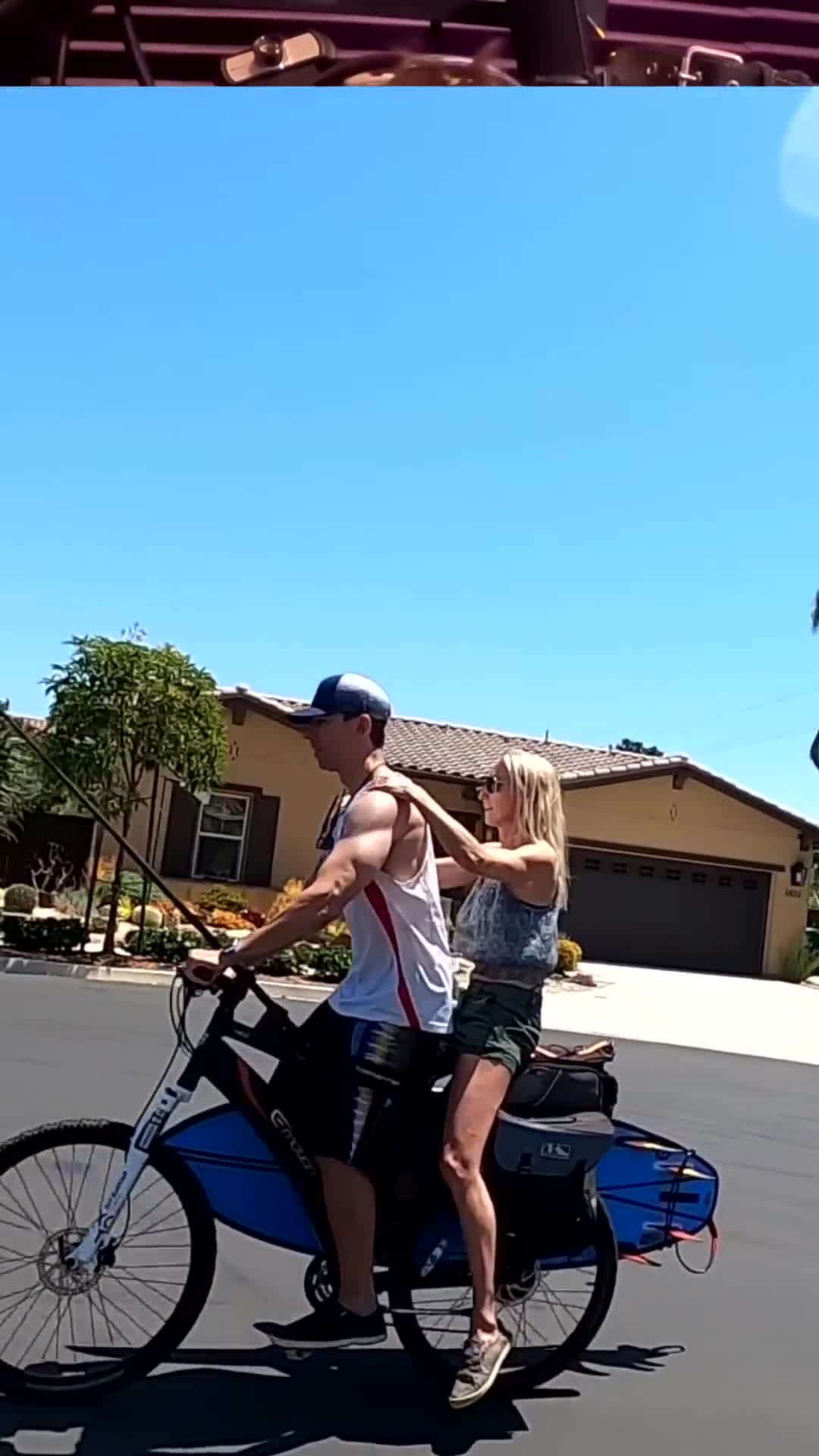 Blind Guy rides a bike with his Banana