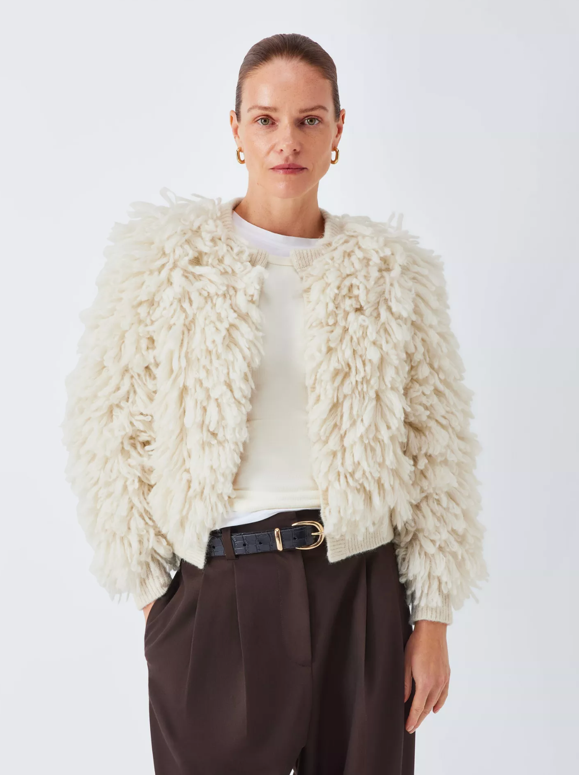 Claudia Winkleman’s fringed jumper is designer, but John Lewis has a ...