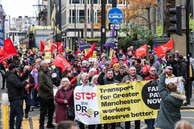 Striking TfGM staff stop traffic in Manchester city centre in ongoing ...
