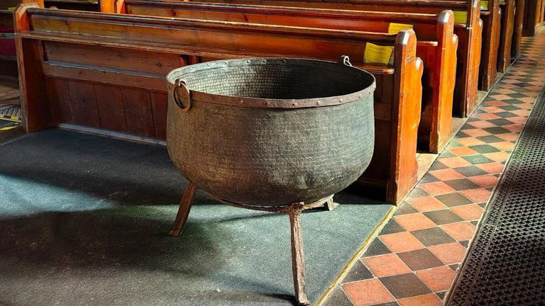 How did a witch's cauldron end up in a church?