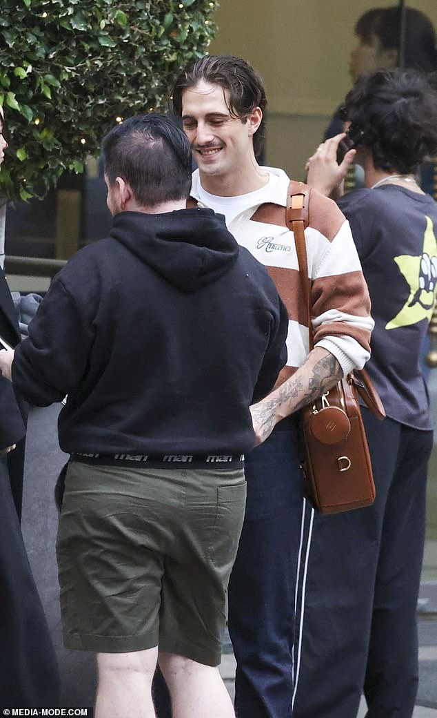 Dove Cameron continues to keep her ring finger hidden in Sydney after ...