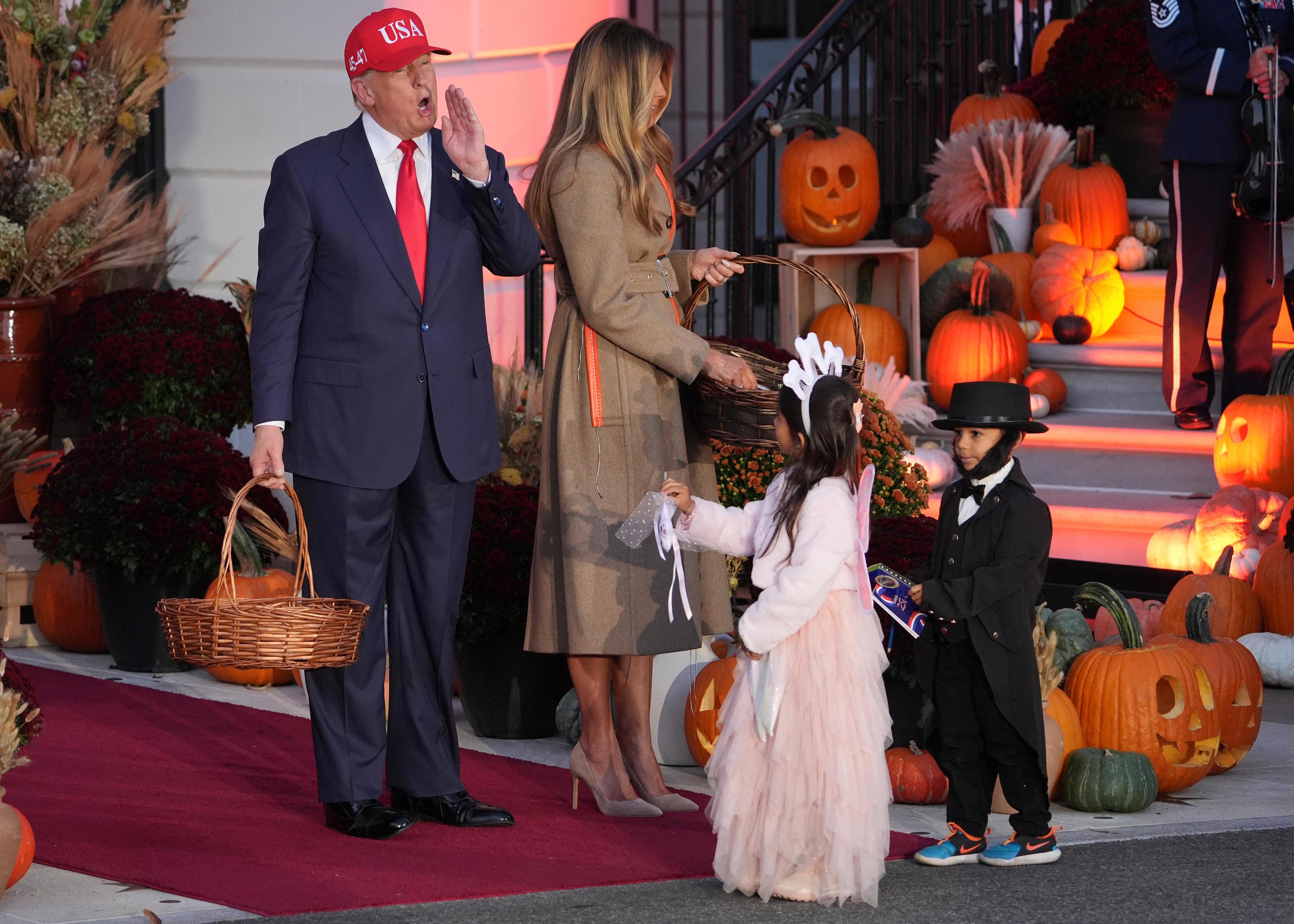 A 'mini' version of Trump and Melania surprises the couple on Halloween