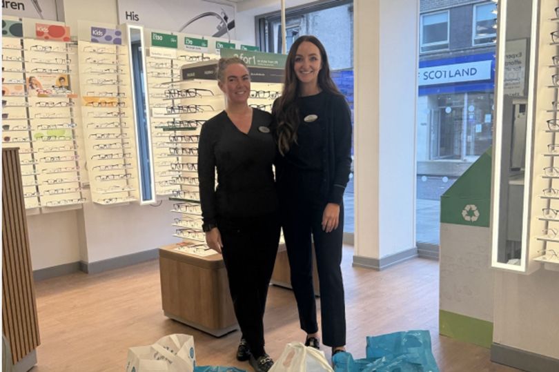 Opticians donate vital items to Wishaw food bank to mark World Homeless Day
