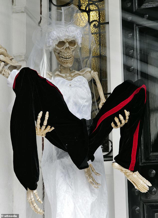 Halloween havoc: Skeletons, coffins and ghouls decorate some of London ...