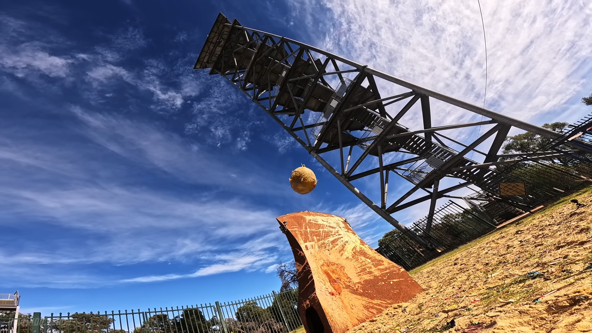 Watch a 200kg rubber band ball meet a giant axe