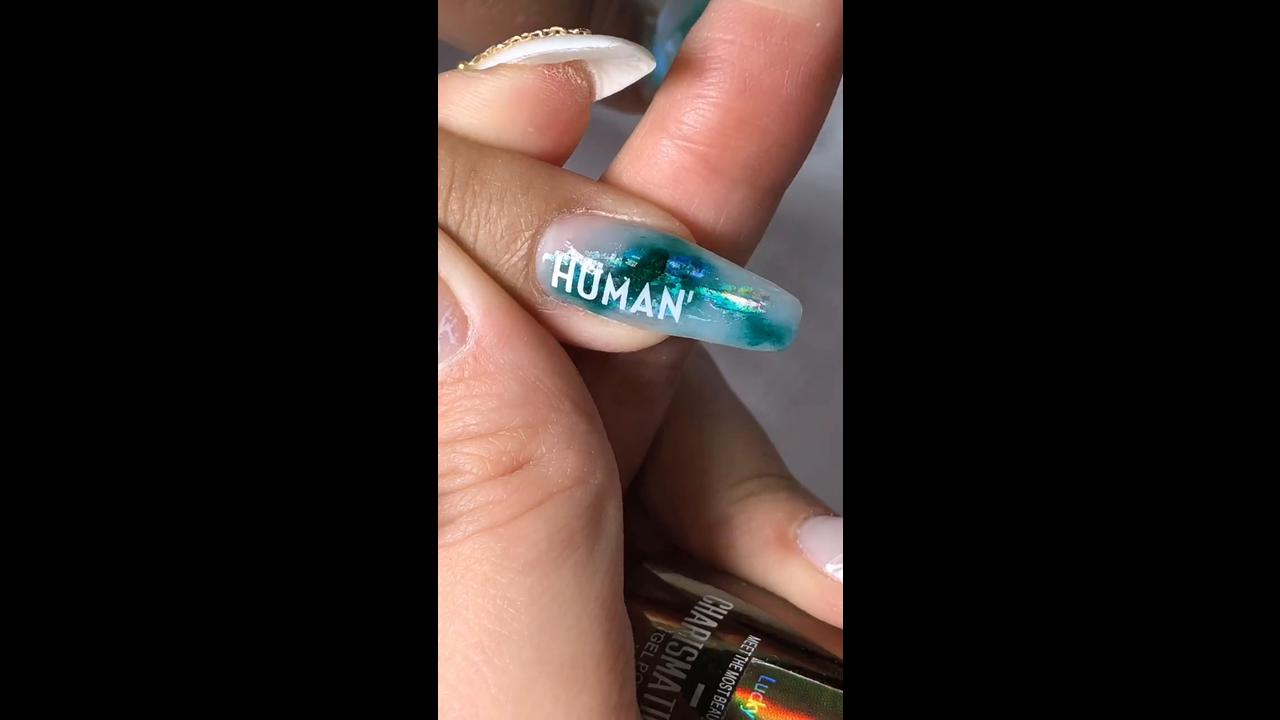 Green Abstract Motif With Human Letter Nail Art