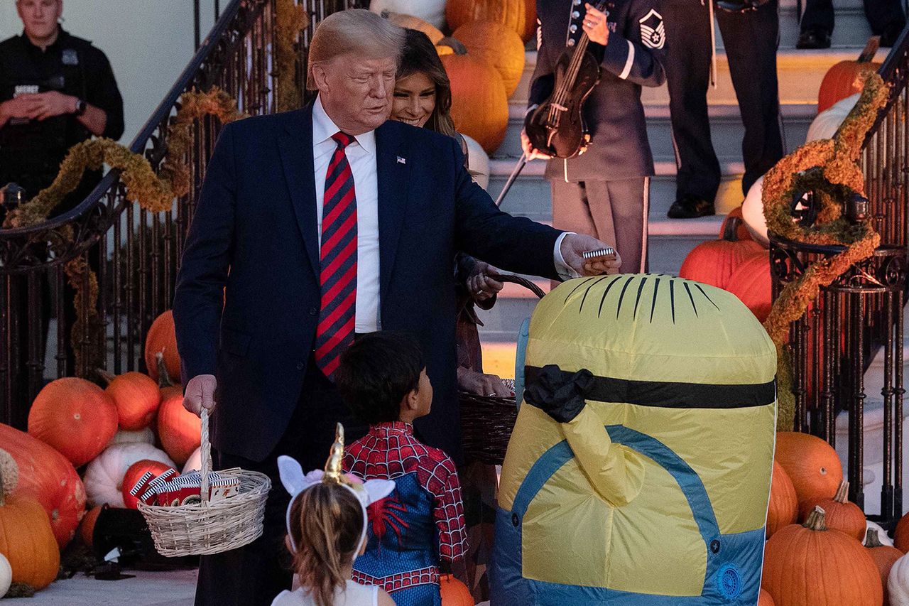 Trump Places Candy on Trick-or-Treater's Head in Recreation of Viral ...