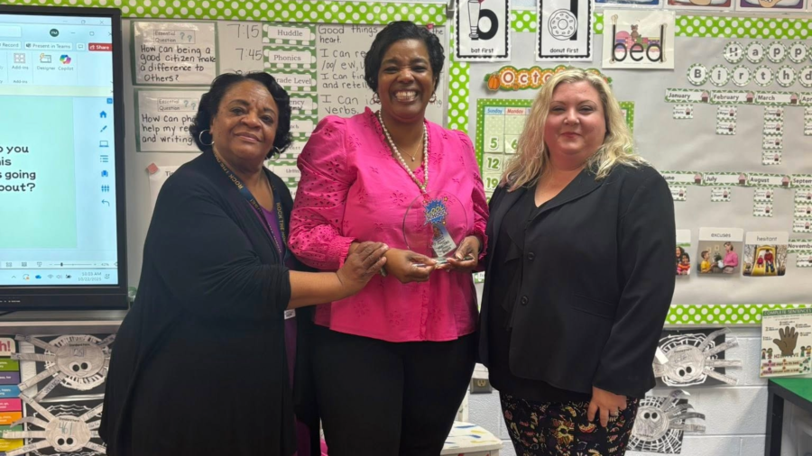 Haley Foster receives the News 2 Cool Teacher award