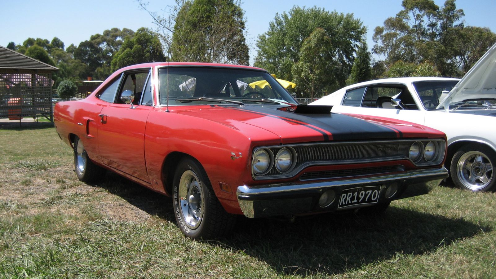 10 Times Automakers Stuffed Absurdly Huge Engines Into Muscle Cars