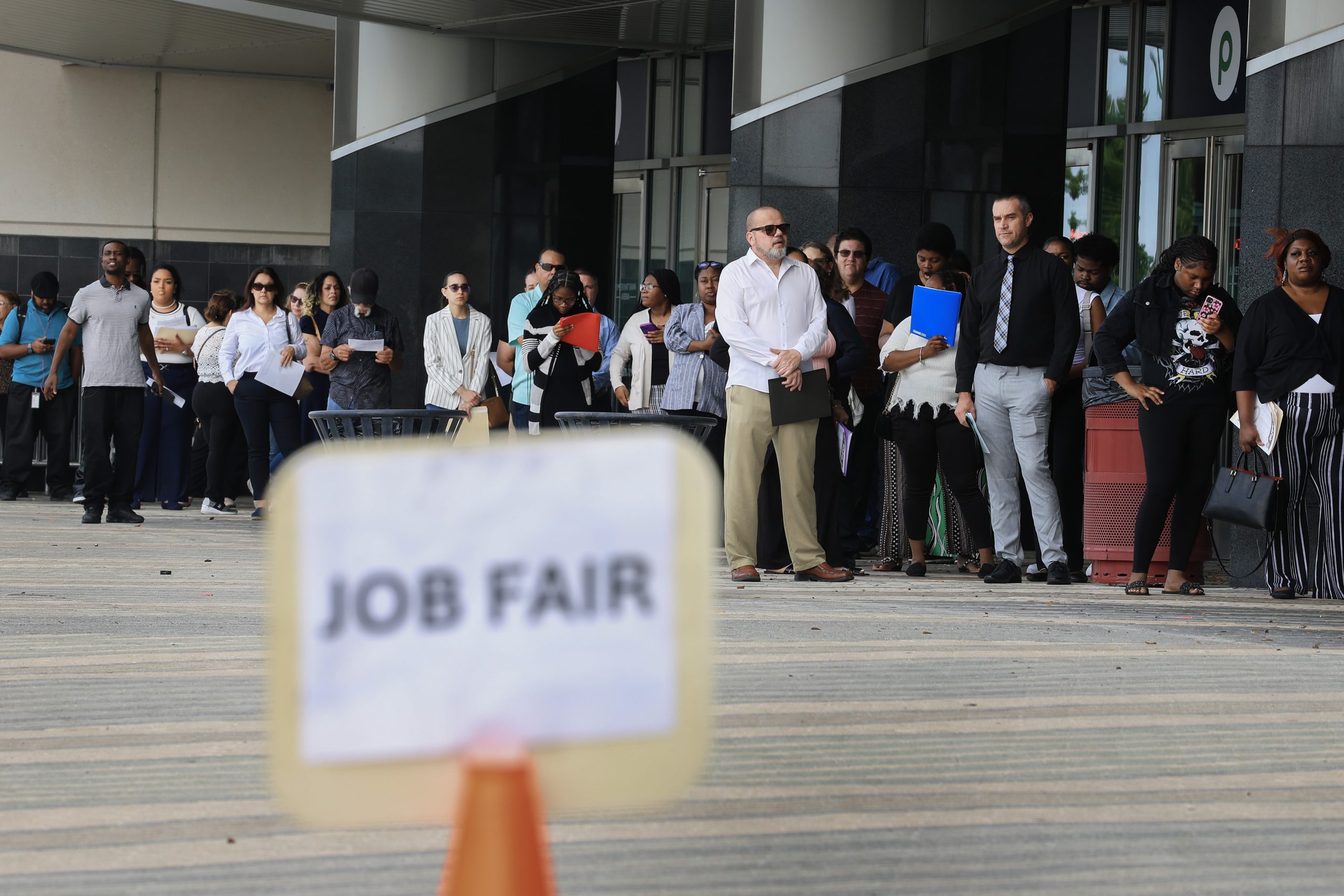 Massive layoffs and hiring freezes —are the US job markets unraveling?