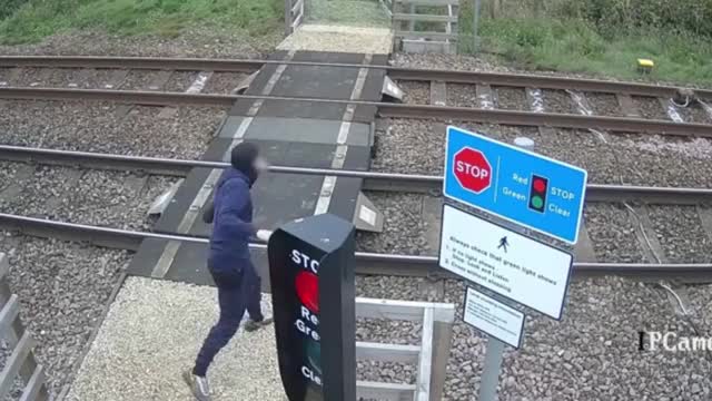 Teenager’s terrifying near-miss with oncoming train captured on video