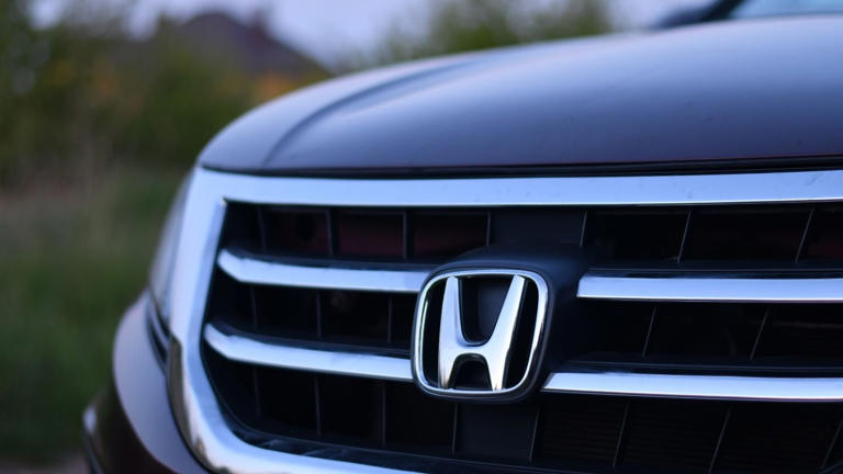 Honda profit slides 33.8% in first half; trims 2030 EV sales target