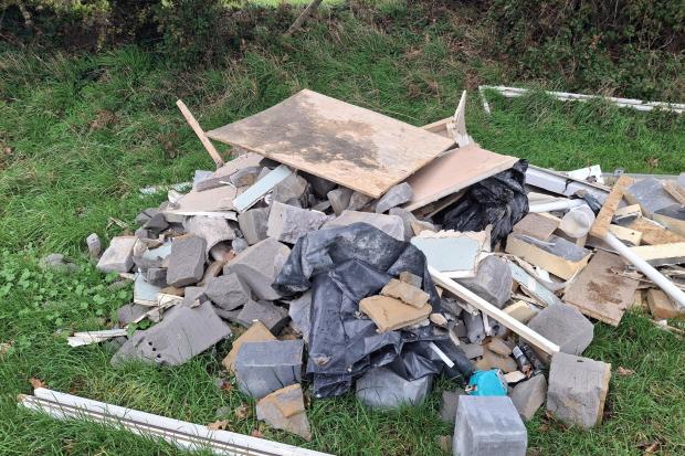 Council issue urgent appeal after fly tipping as pipe and wood dumped