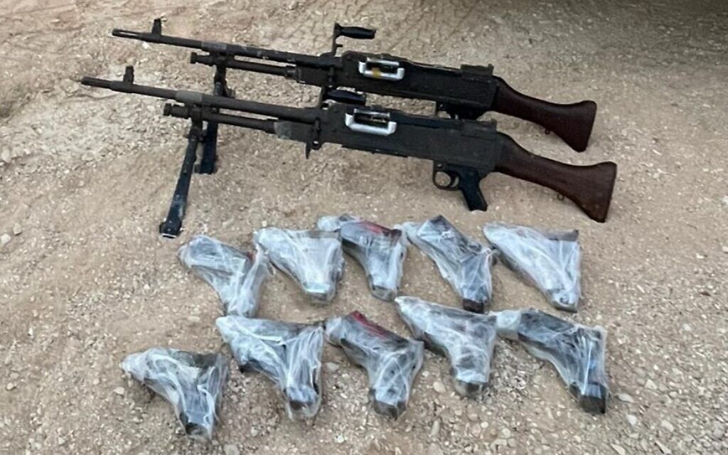IDF says it seized pair of machine guns, 10 pistols smuggled across ...