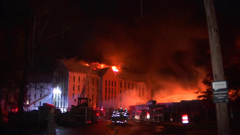 More than 200 displaced after huge fire destroys buildings at Mass ...