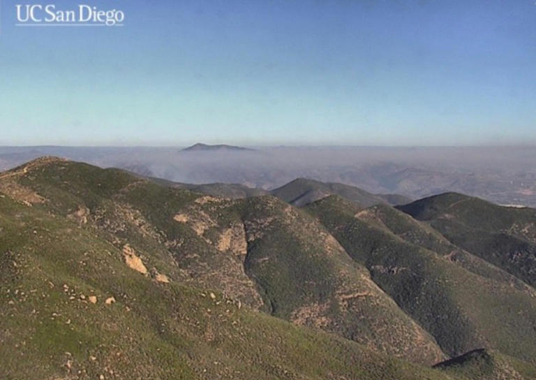 Air tankers, fire crews battling brush fire near border